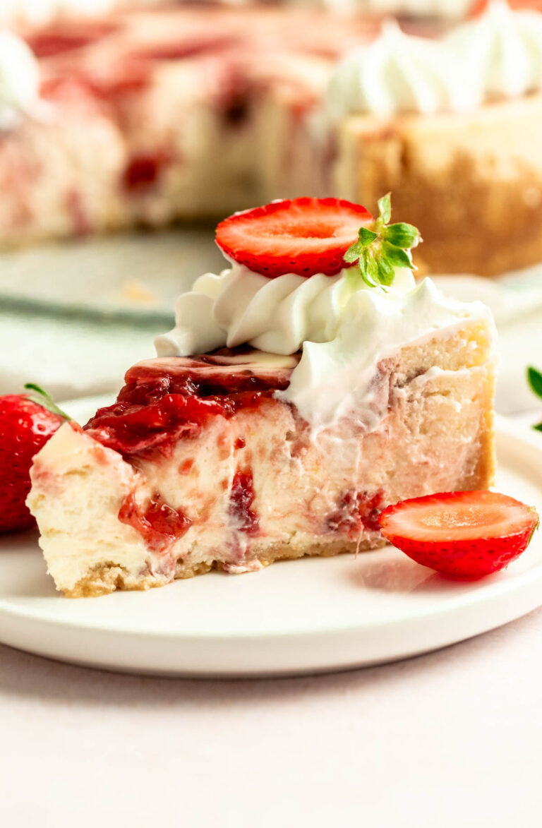Creamy Strawberry Swirl Cheesecake - Rich And Delish